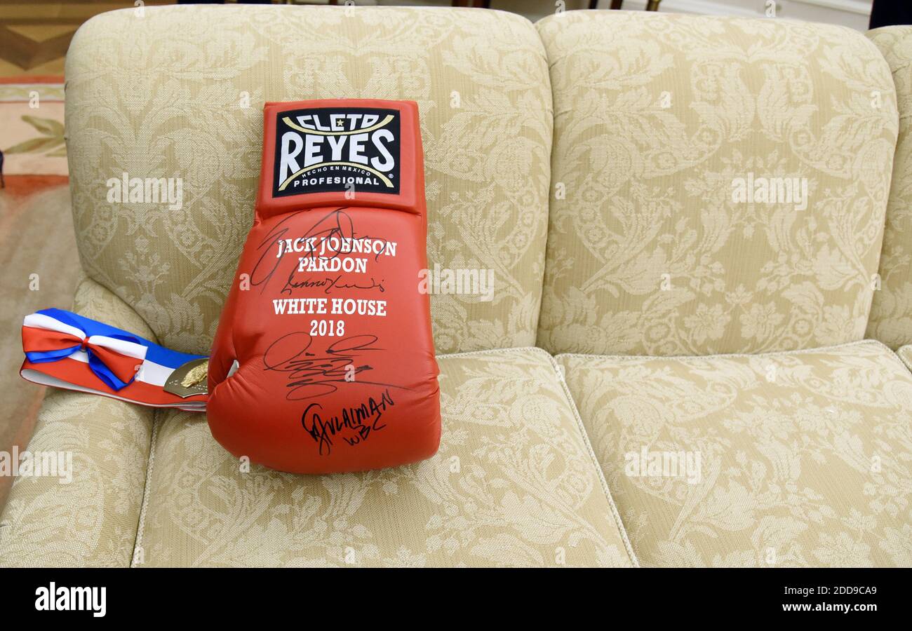 A signed boxing glove lay on the sofa after US President Donald Trump ...