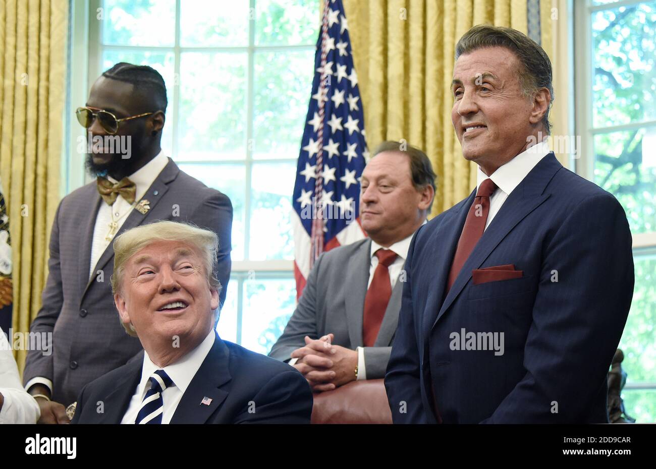 Actor Sylvester Stallone (R) and President Donald Trump (L) share a ...
