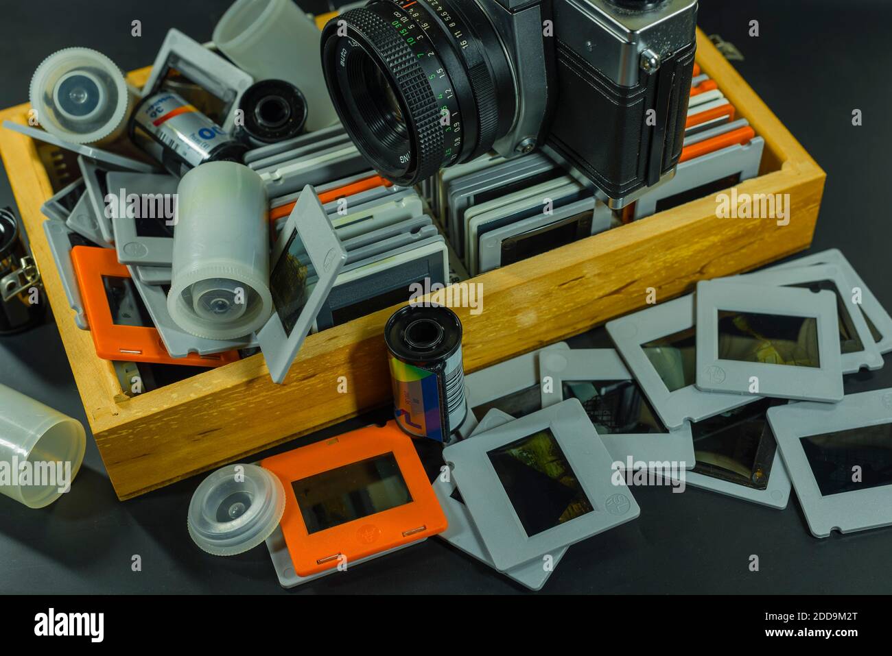 35mm Slide-Photos, An old analog camera and a wooden box with slides ...