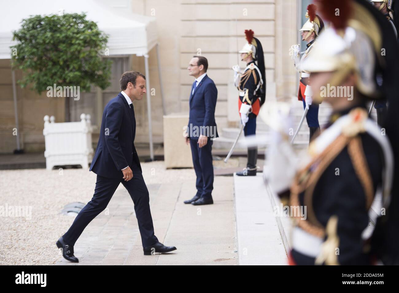 Surrounded by Republican Guards, French president Emmanuel Macron ...
