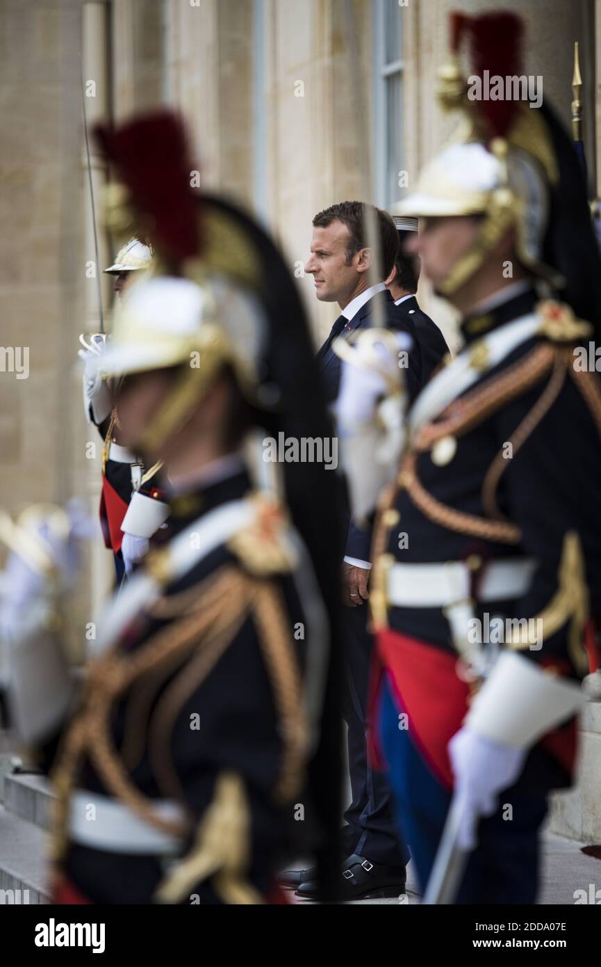 Surrounded by Republican Guards, French president Emmanuel Macron ...