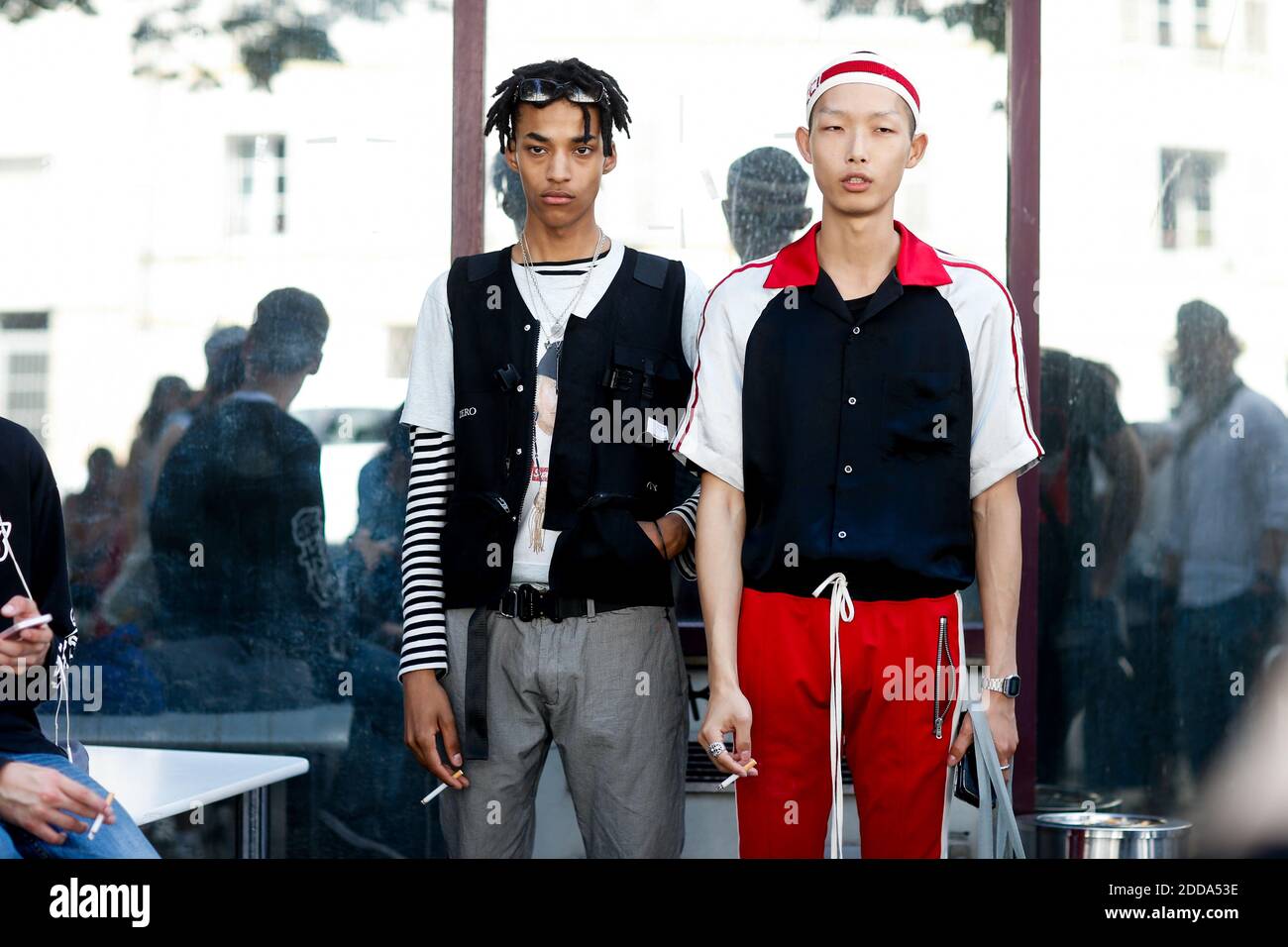 Street style, models Tristan Cole and Xu Meen after Acne Spring-Summer ...