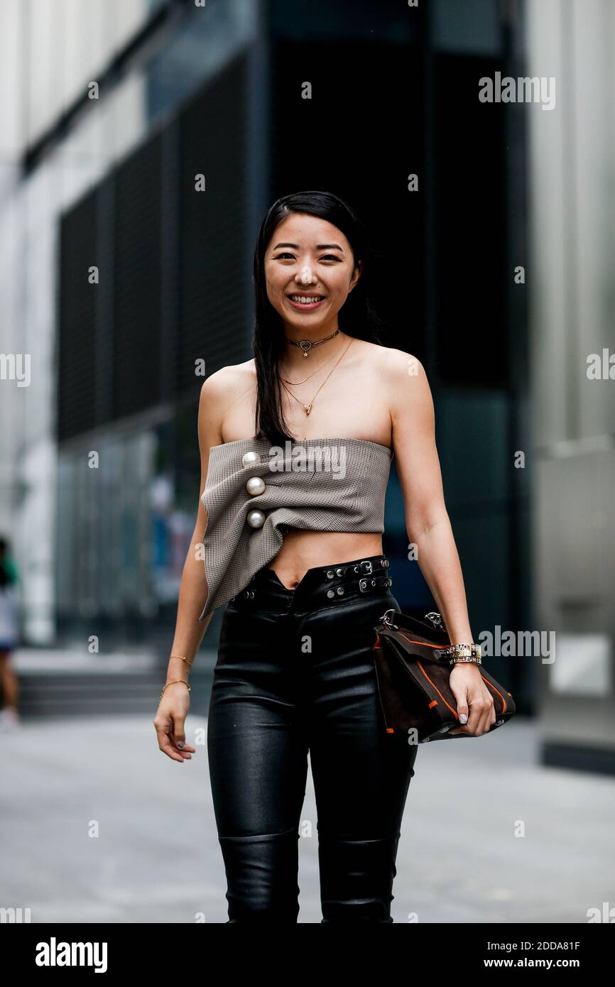 Street style, Yuwei Zhangzou arriving at Longchamp spring summer 2019 ready-to-wear show, held ...