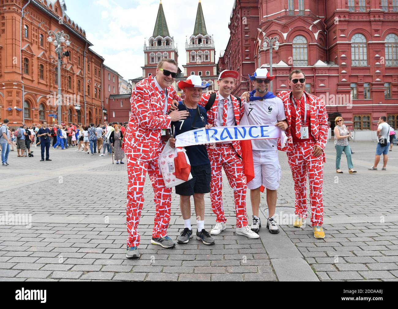 French and Danish fans pose together on the Red Square ahead of the ...