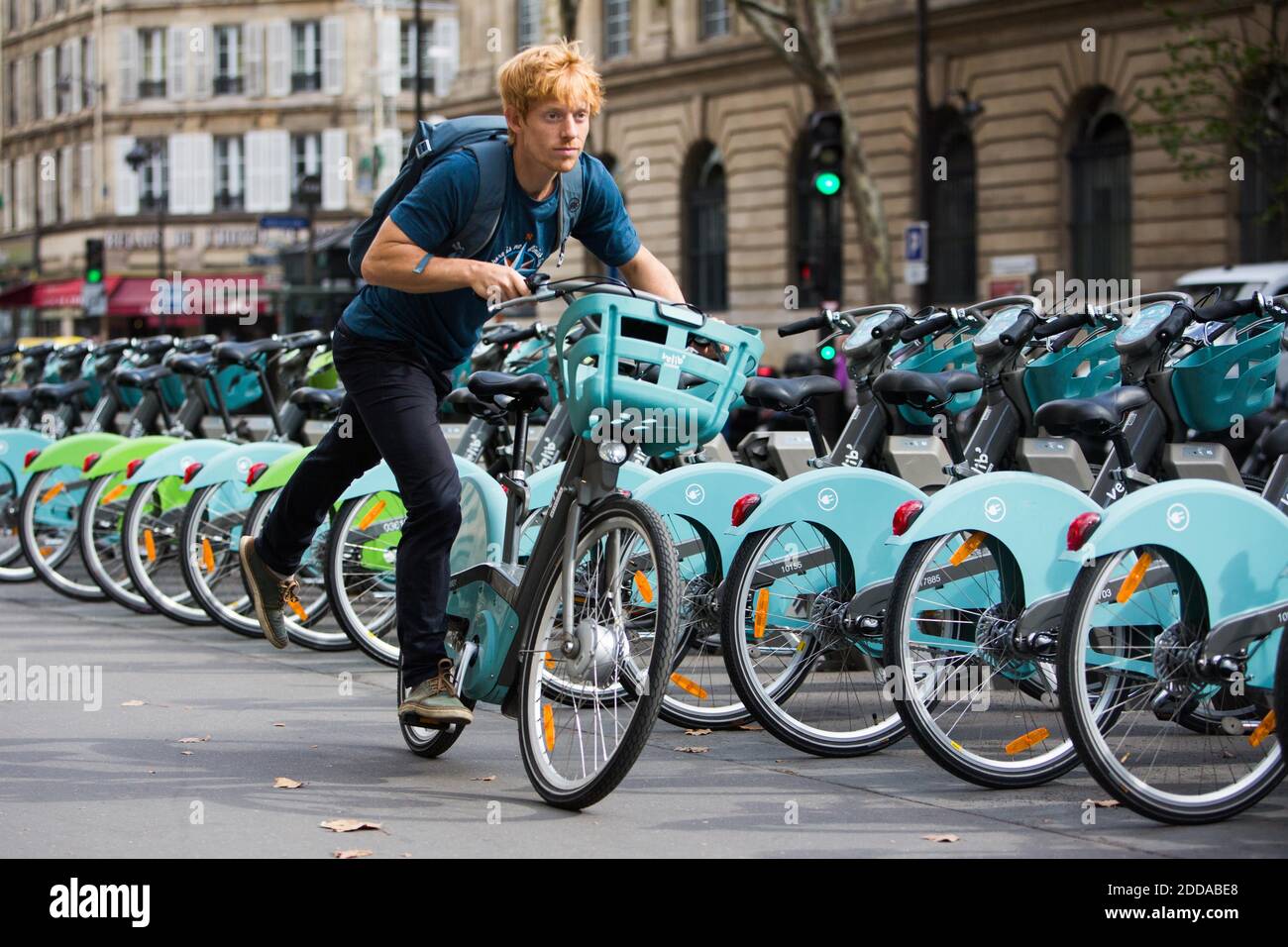 Cyclist use the new bike path, part of the Reseau Express Velo (REVe ...