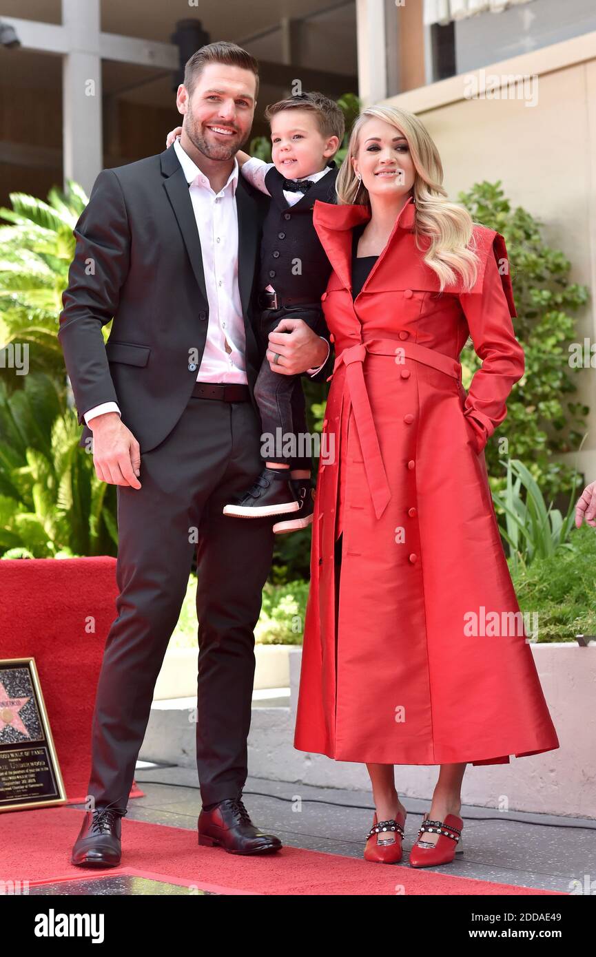 Mike Fisher, Isaiah Michael Fisher attend the ceremony honoring Carrie ...