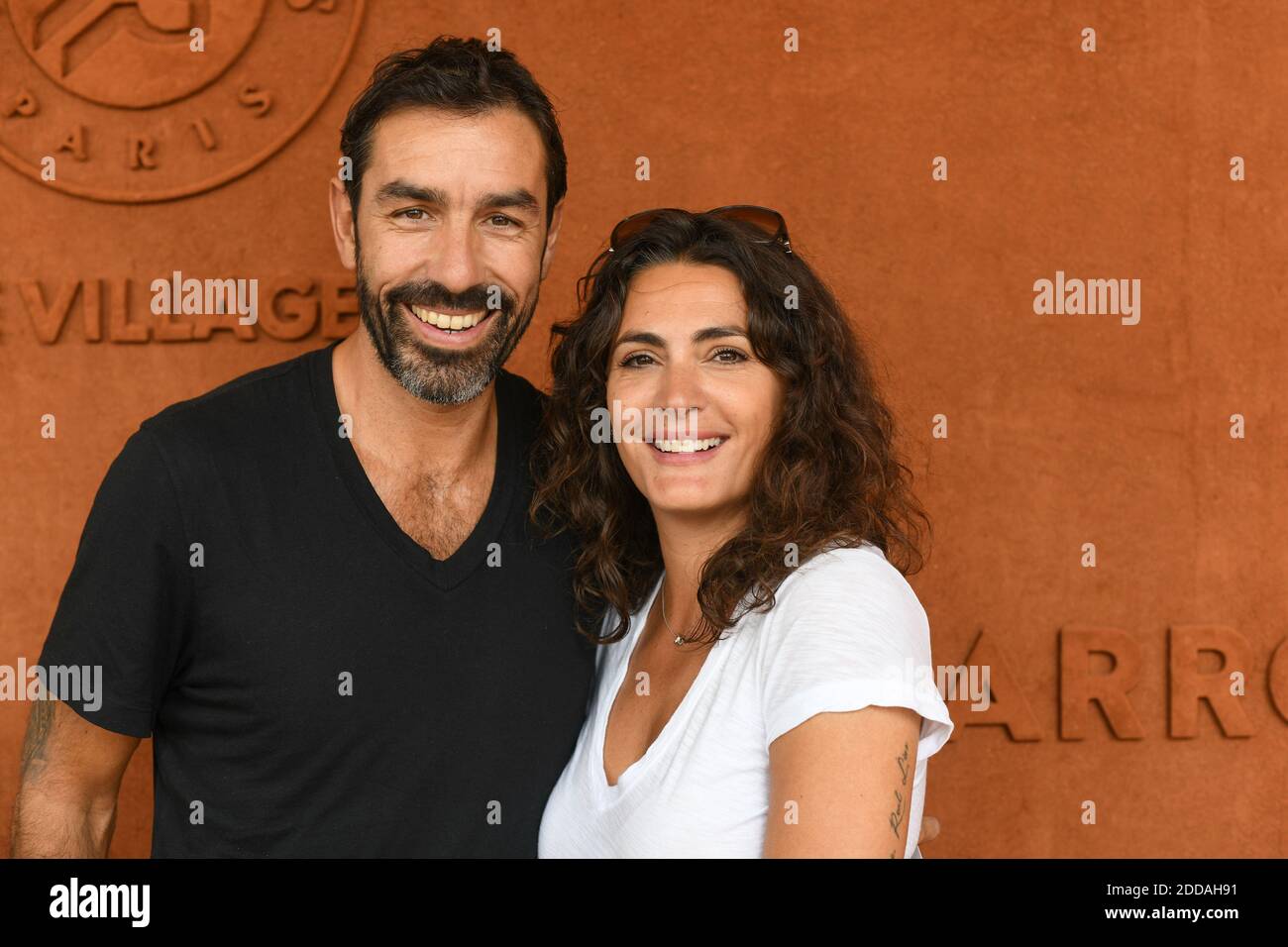 Robert Pires and his wife Jessica Lemarie attend the 2018 French Open ...