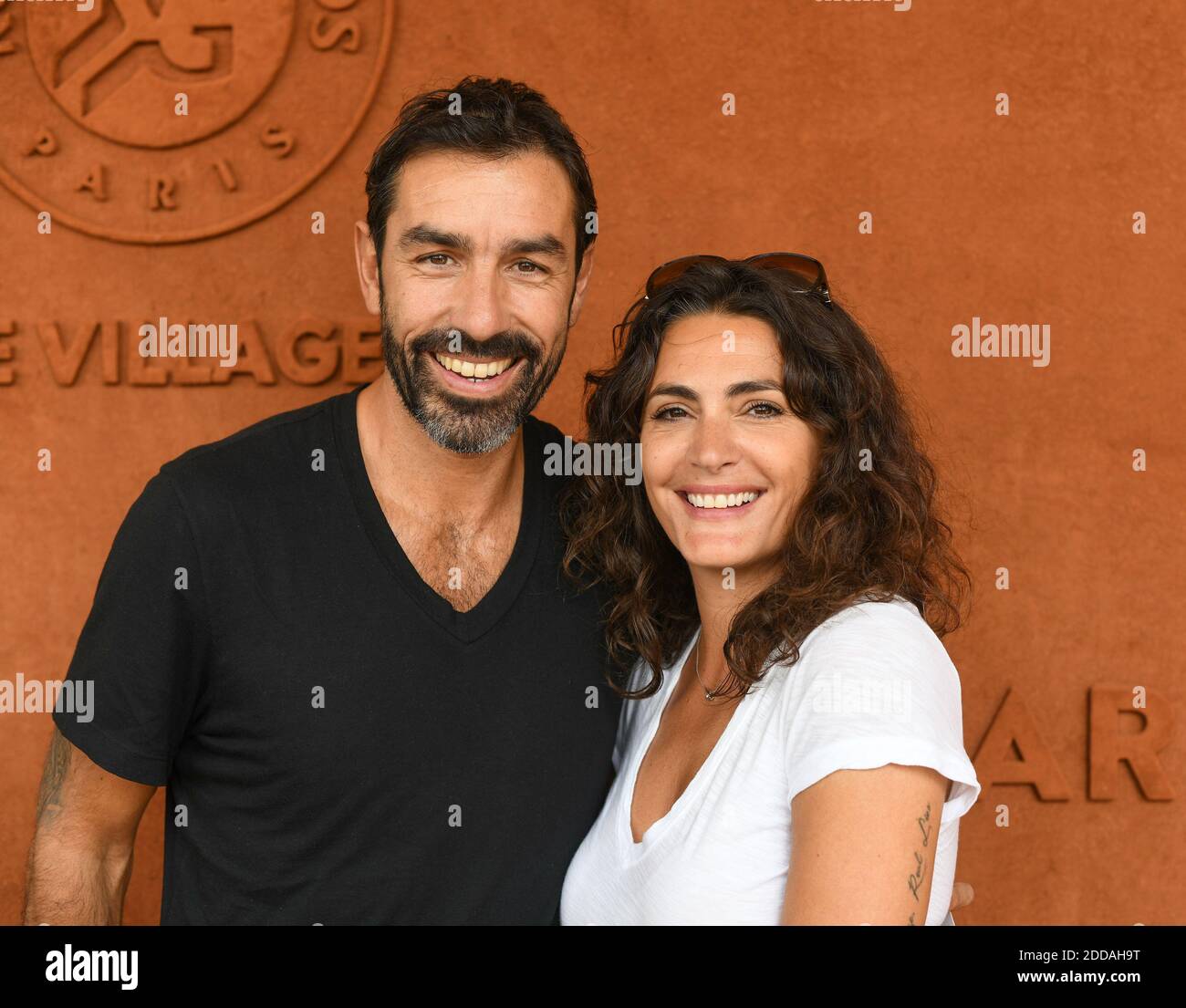 Robert Pires and his wife Jessica Lemarie attend the 2018 French Open ...