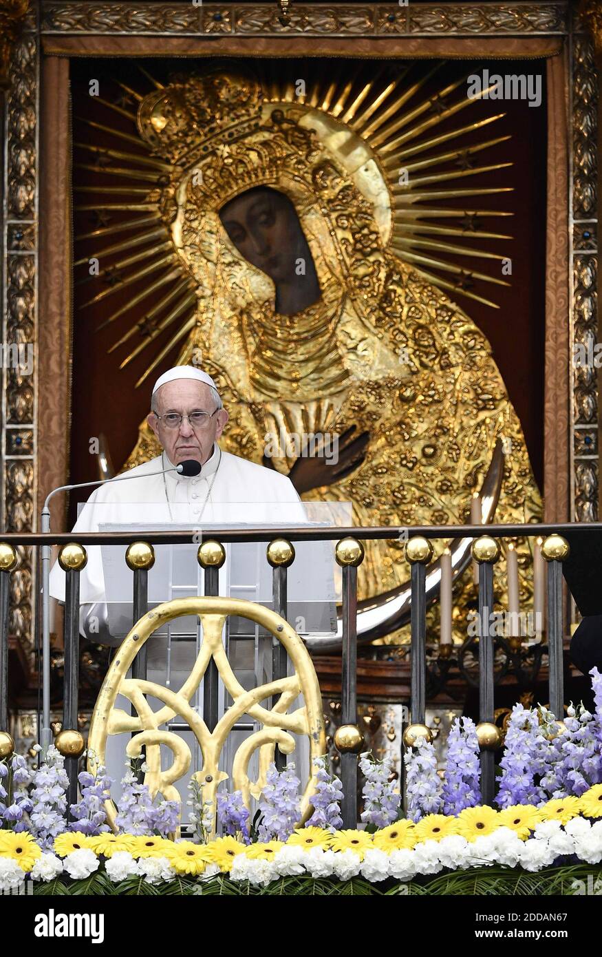 Pope Francis addresses worshippers in front of an image of Mary Mater ...