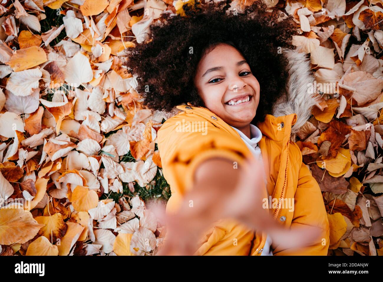 Smiling positive girl lying on hi-res stock photography and images - Alamy