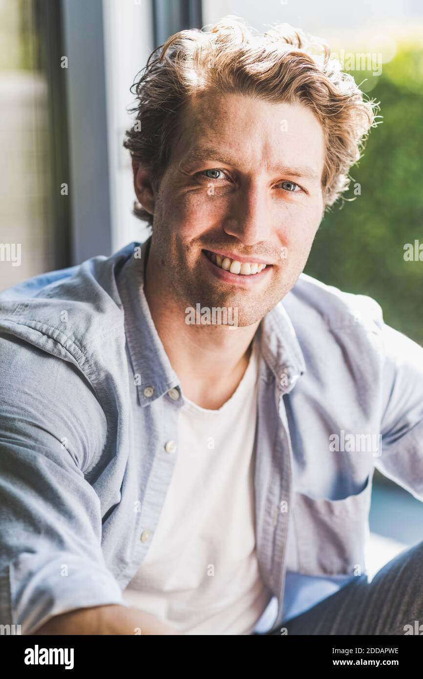 Portrait happy mid adult man hi-res stock photography and images - Alamy