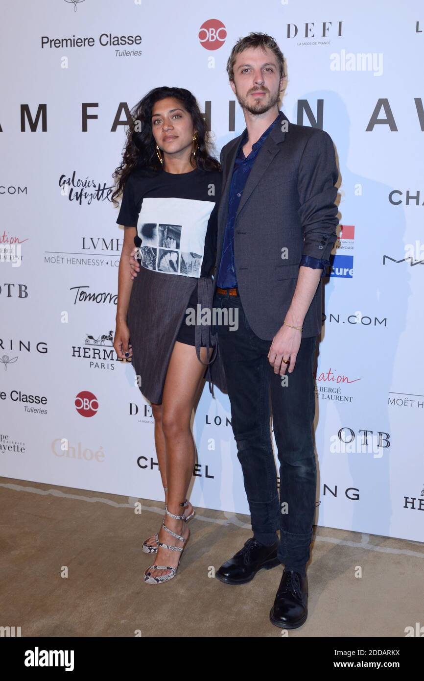 Glenn Martens and guest attending the Andam Fashion Awards 2018 ...
