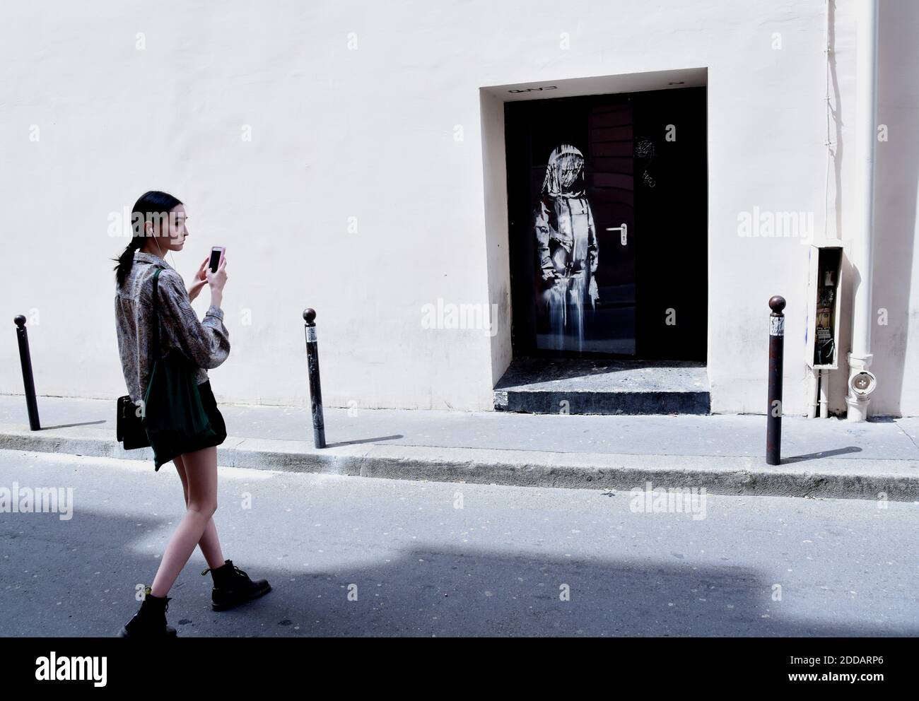 A recent artwork by street artist Banksy in Paris, France, on June 29 ...