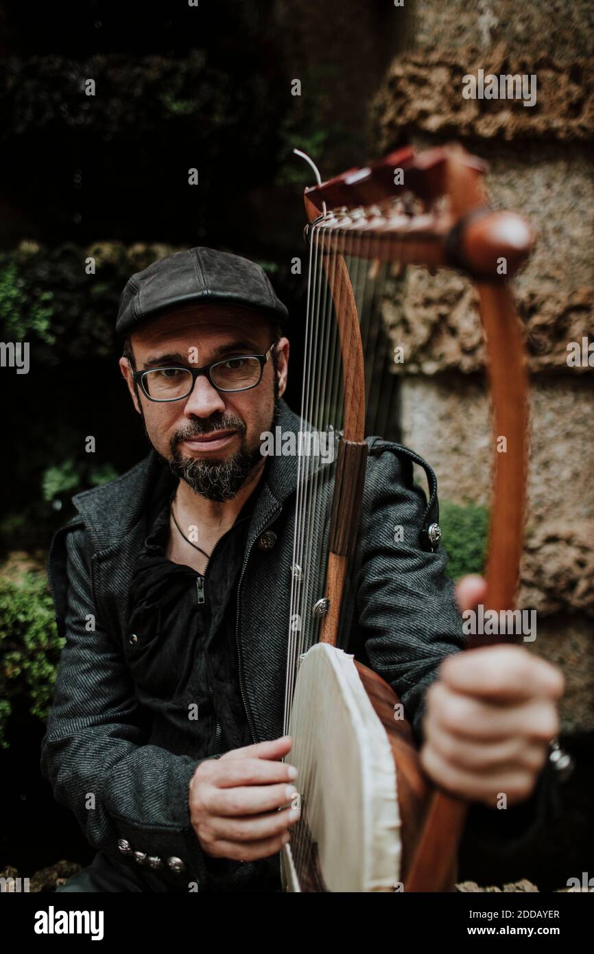 Male playing an instrument hi-res stock photography and images - Alamy