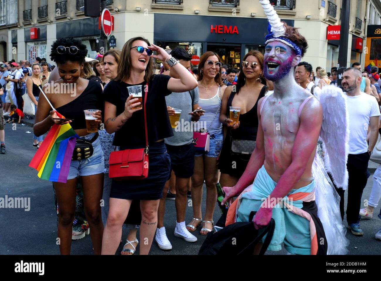 Revelers take part in the annual Gay Pride parade in Paris, France, on ...