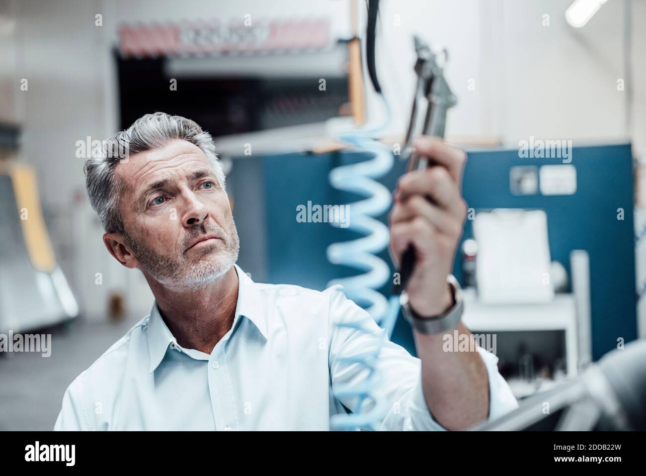 Male engineer examining equipment hi-res stock photography and images ...