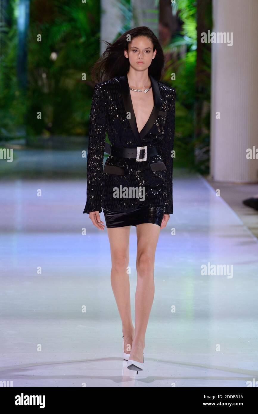 A model walks the runway during the Azzaro Haute Couture Paris Fashion ...