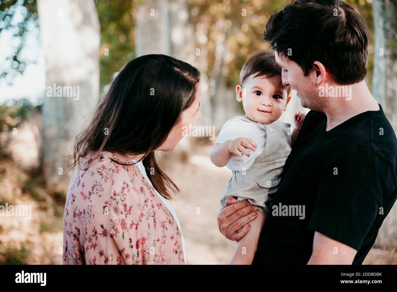 Family group standing outdoors hi-res stock photography and images - Alamy