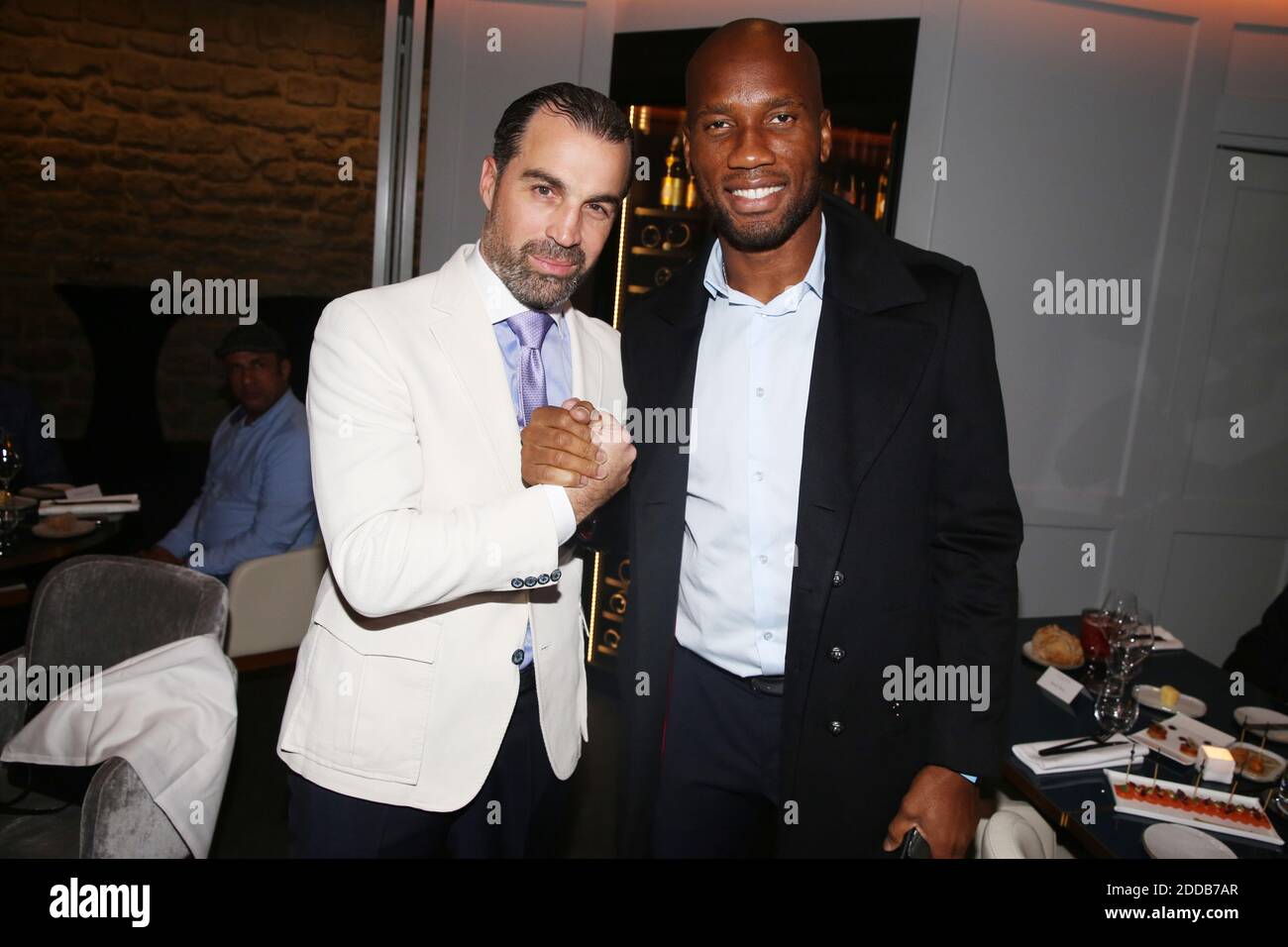 Exclusive - Herve Marwan Hurstel and Didier Drogba attending "Edern ...