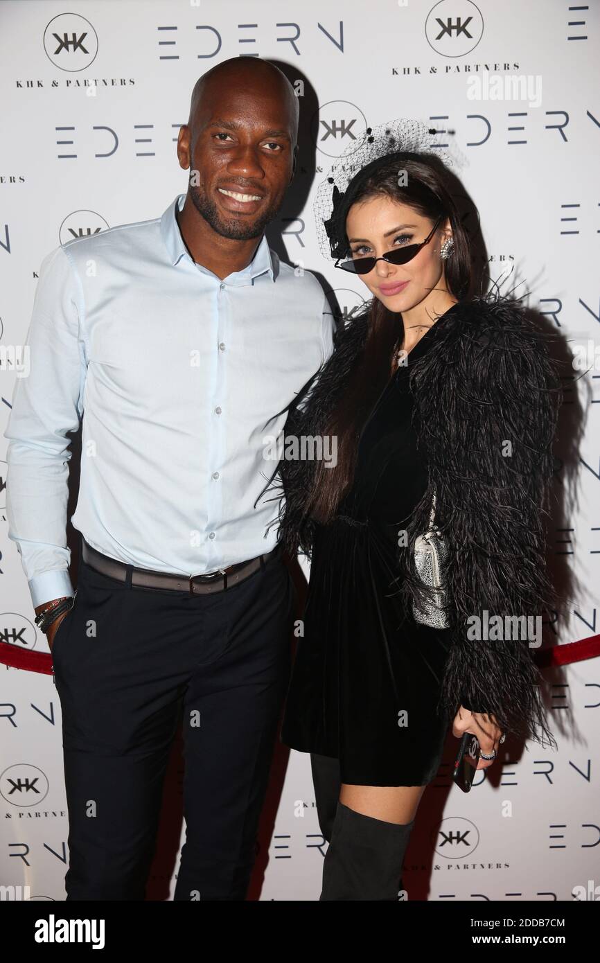Exclusive - Didier Drogba and Deborah Valdez-Hung attending "Edern ...