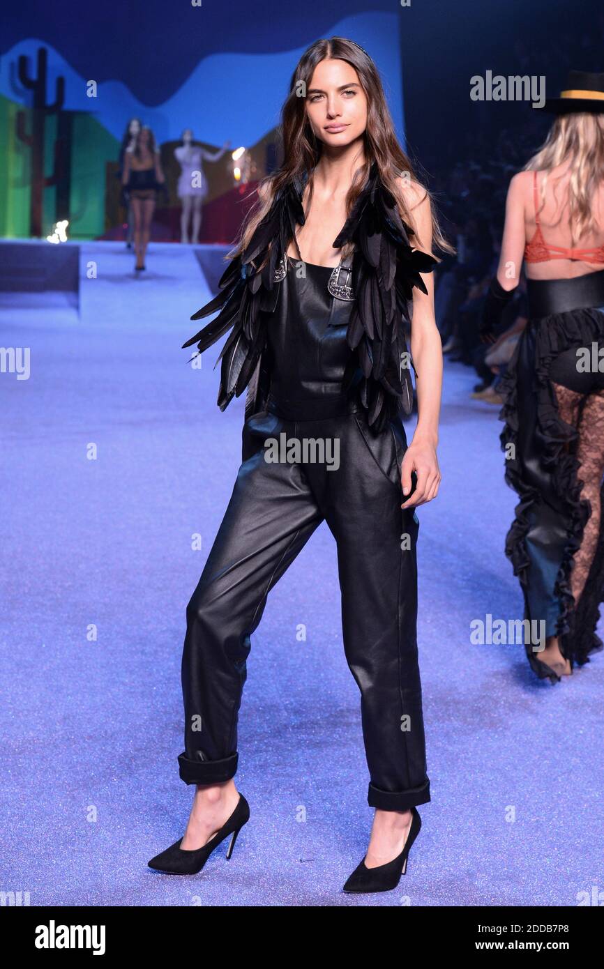 A model walks the runway during the Etam Fashion Show as part of Paris ...