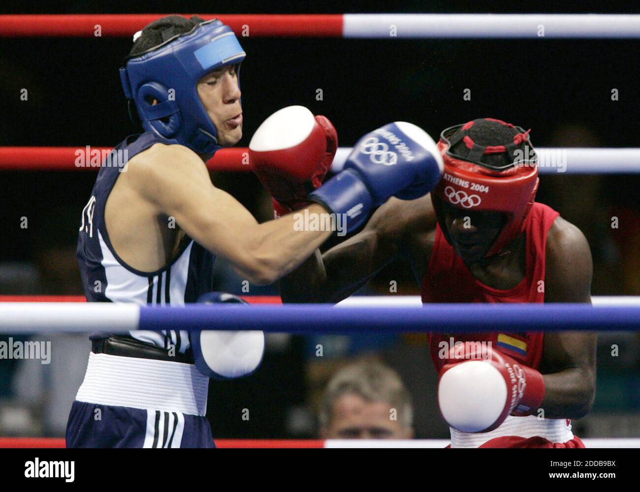 NO FILM, NO VIDEO, NO TV, NO DOCUMENTARY - USA's Vicente Escobedo, left ...