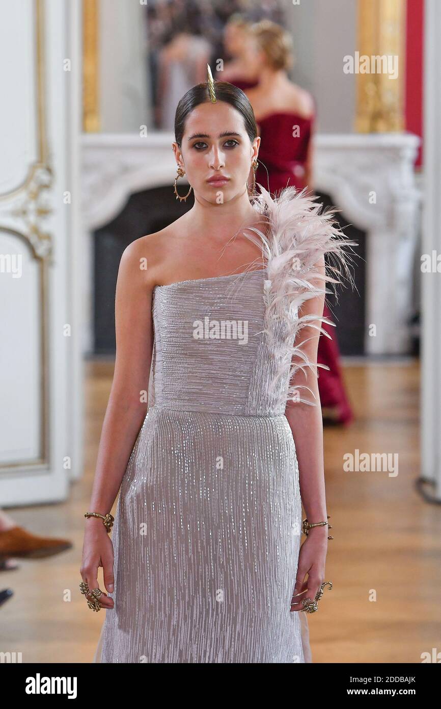 Taleedah Tamer walks the runway during Antonio Grimaldi Haute Couture ...