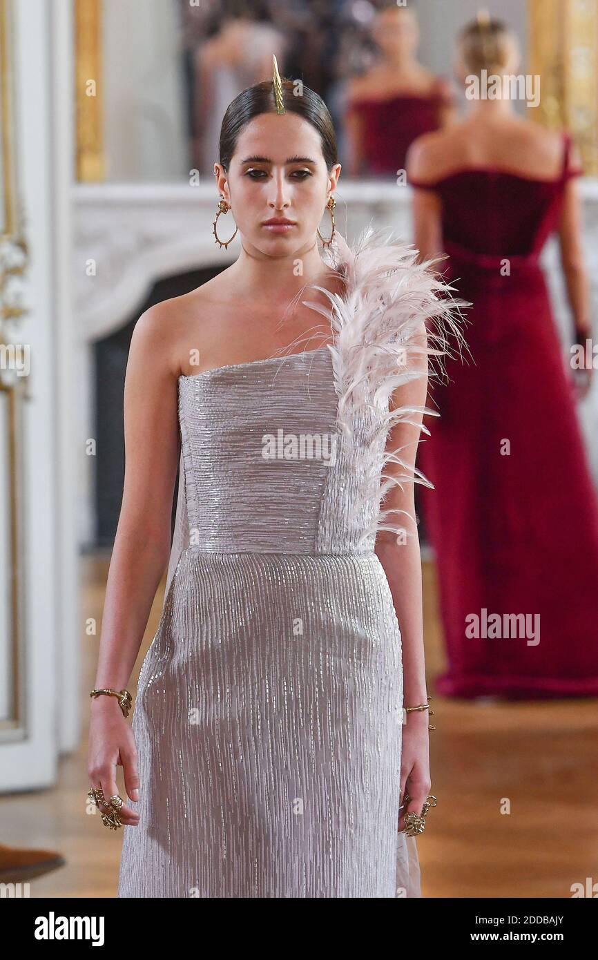 Taleedah Tamer walks the runway during Antonio Grimaldi Haute Couture ...