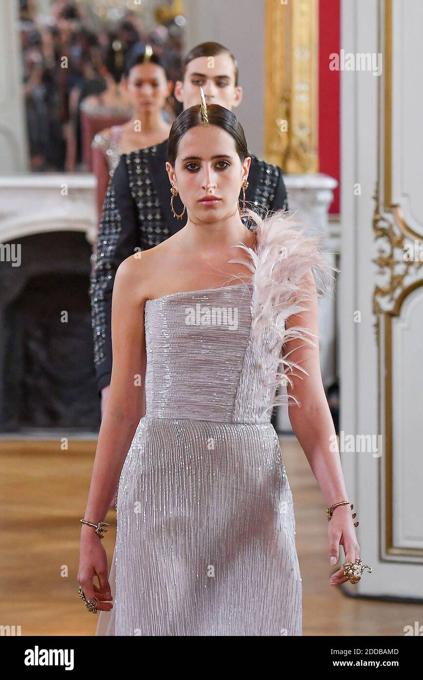 Taleedah Tamer walks the runway during Antonio Grimaldi Haute Couture ...