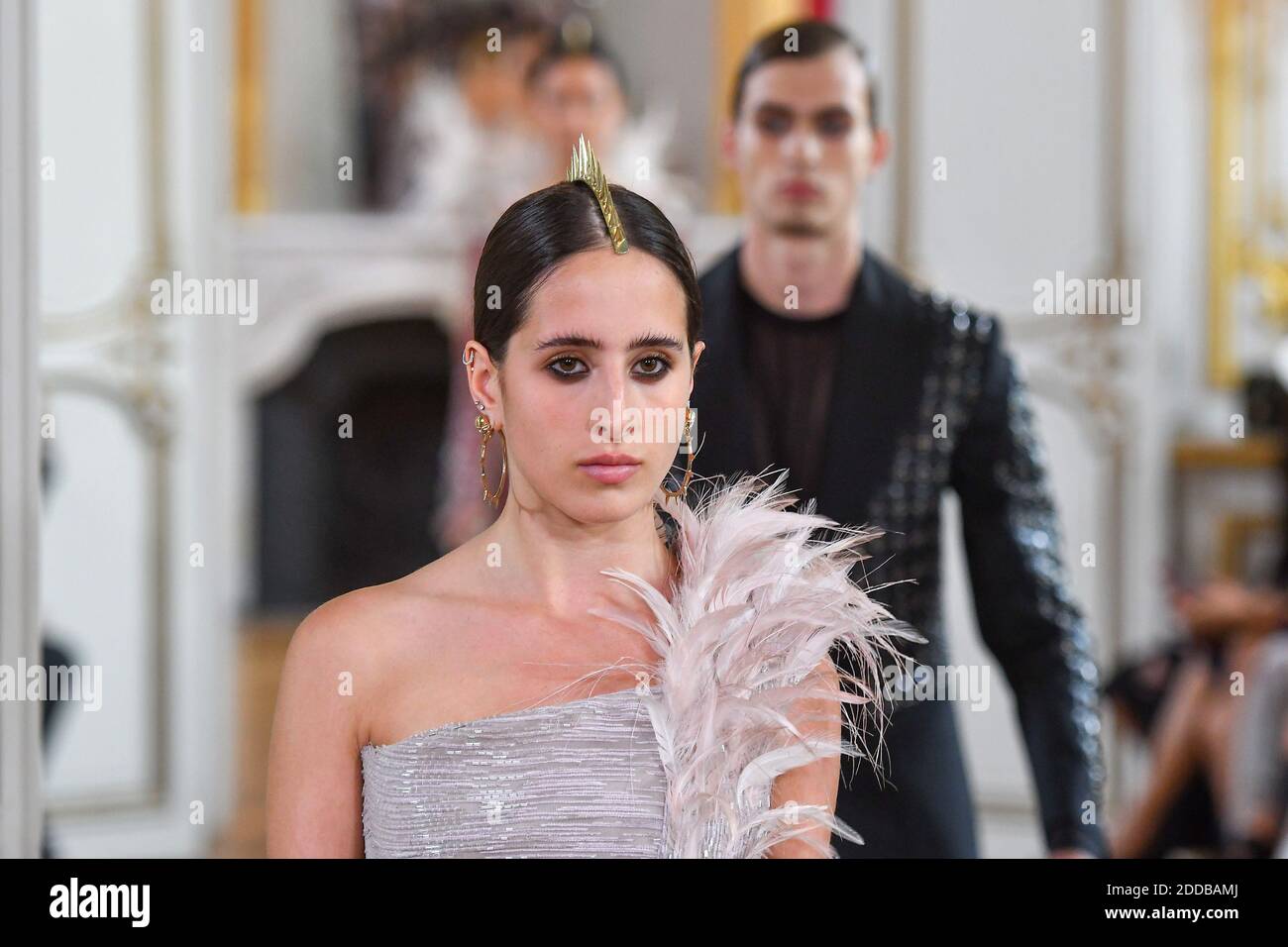 Taleedah Tamer walks the runway during Antonio Grimaldi Haute Couture ...
