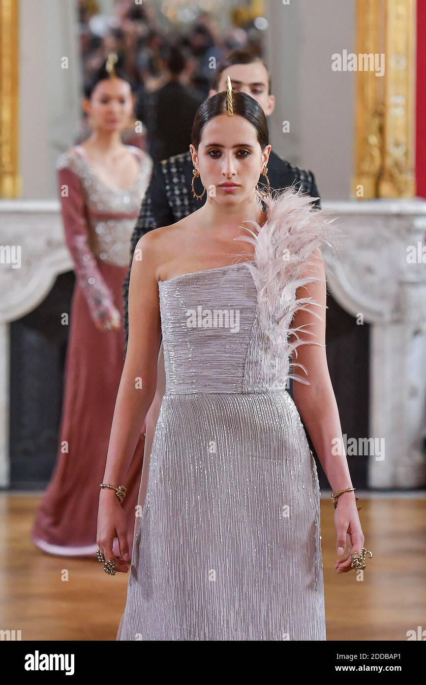 Taleedah Tamer walks the runway during Antonio Grimaldi Haute Couture ...