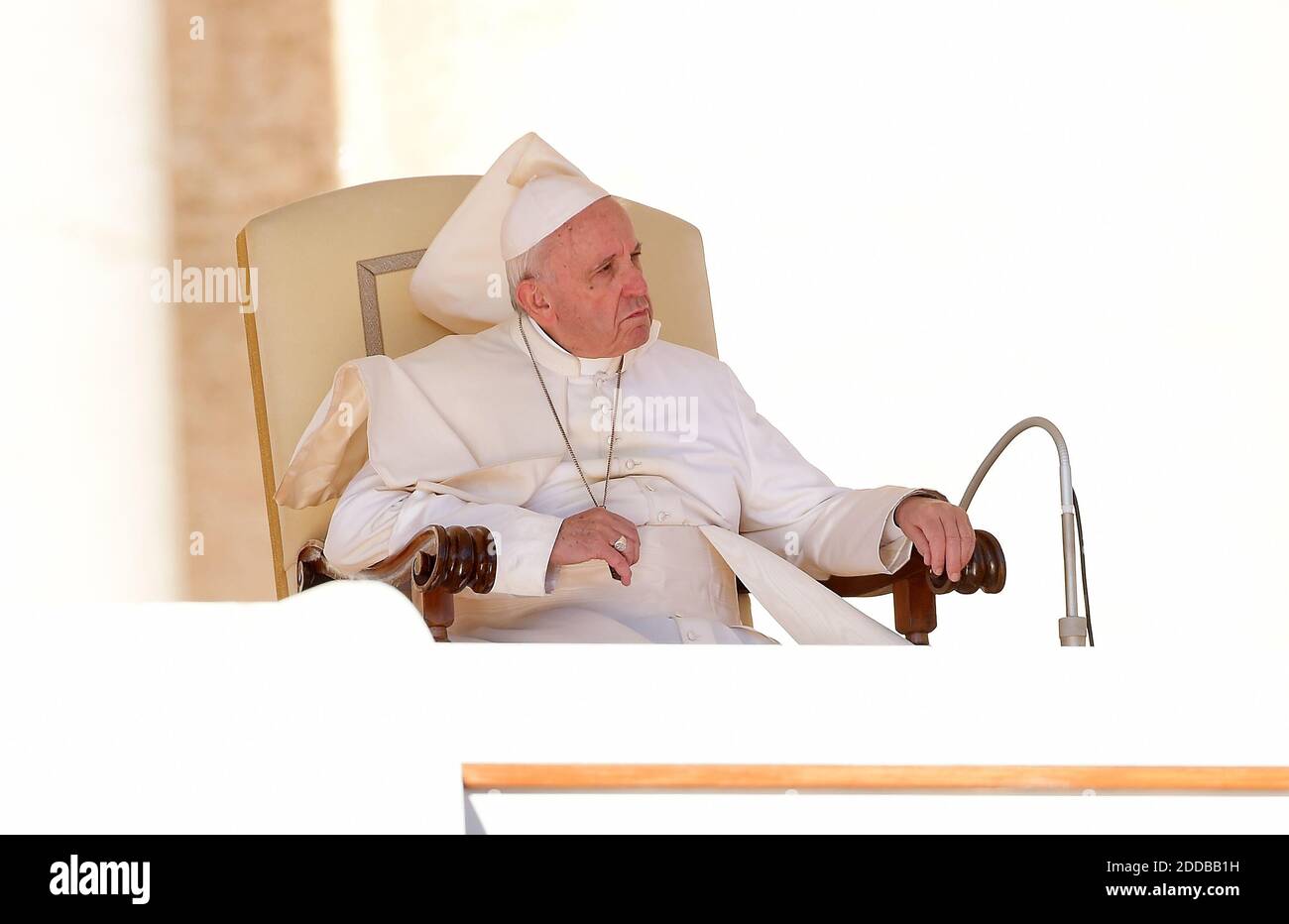 The wind blows the dress of Pope Francis as he attends the weekly ...