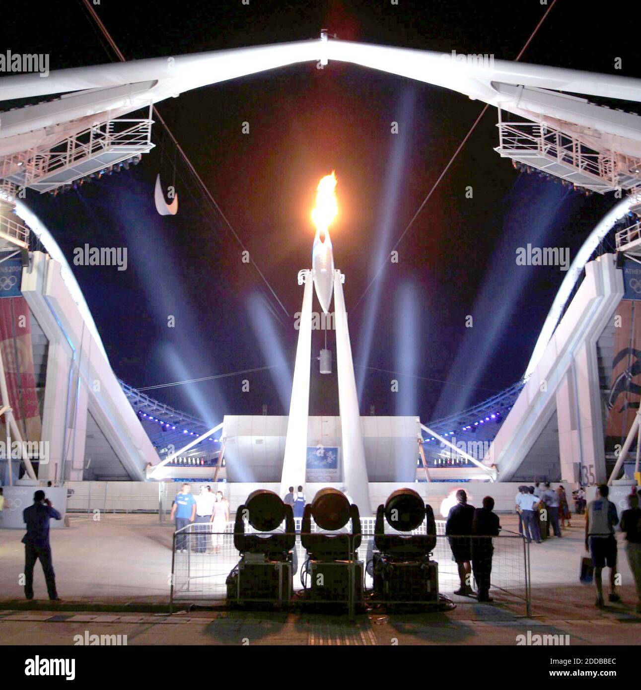 NO FILM, NO VIDEO, NO TV, NO DOCUMENTARY - The Olympic Flame rises over ...