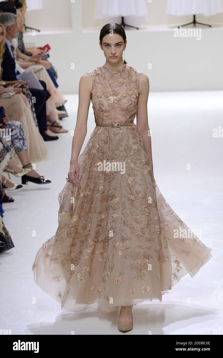 A model walks the runway during the Christian Dior Haute Couture Paris ...