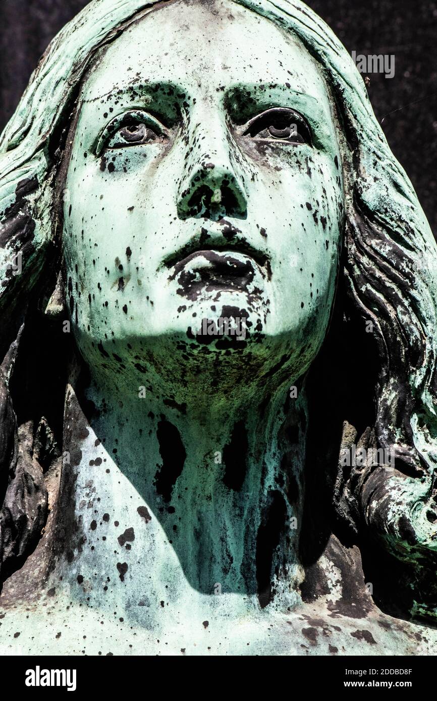 Face of weathered angel statue Stock Photo - Alamy