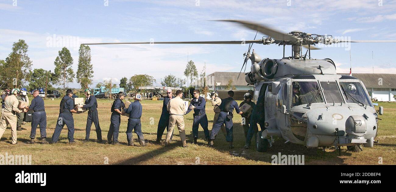 NO FILM, NO VIDEO, NO TV, NO DOCUMENTARY - Personnel from the aircraft ...