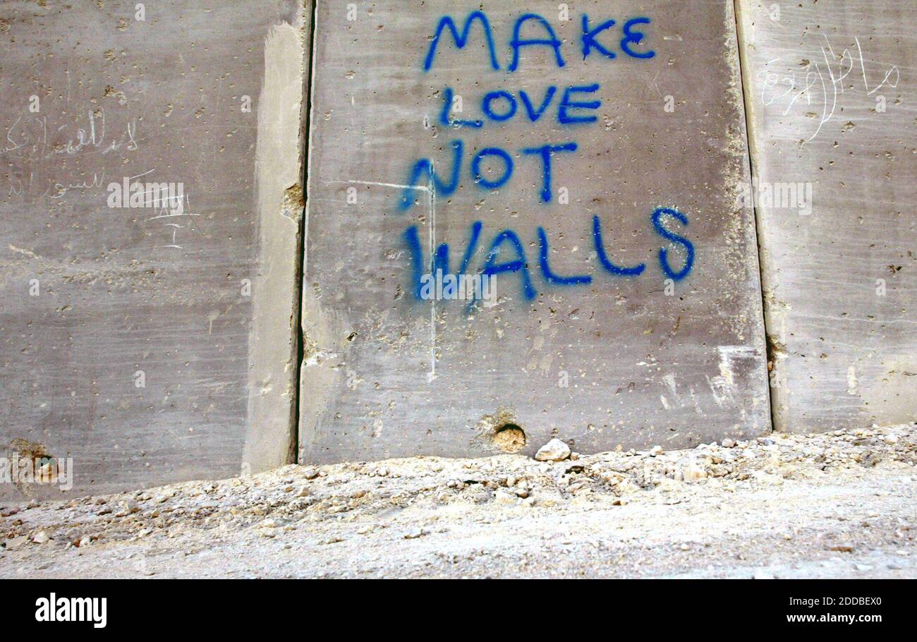 NO FILM, NO VIDEO, NO TV, NO DOCUMENTARY - Grafitti appears on various ...