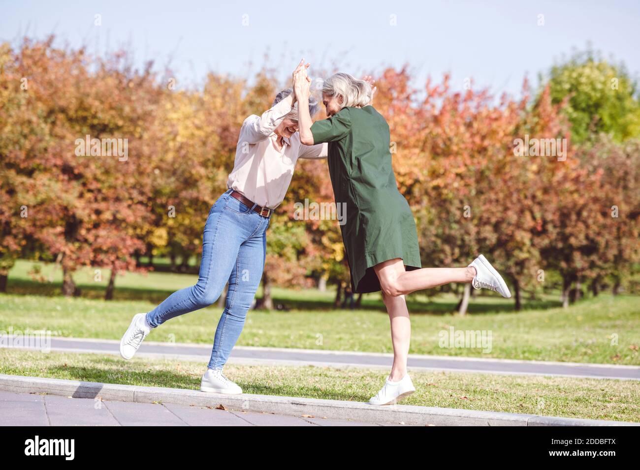 Women dancing on road hi-res stock photography and images - Alamy