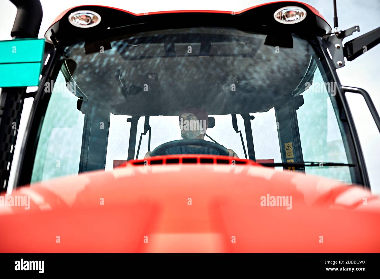 Farmer driving tractor hi-res stock photography and images - Alamy
