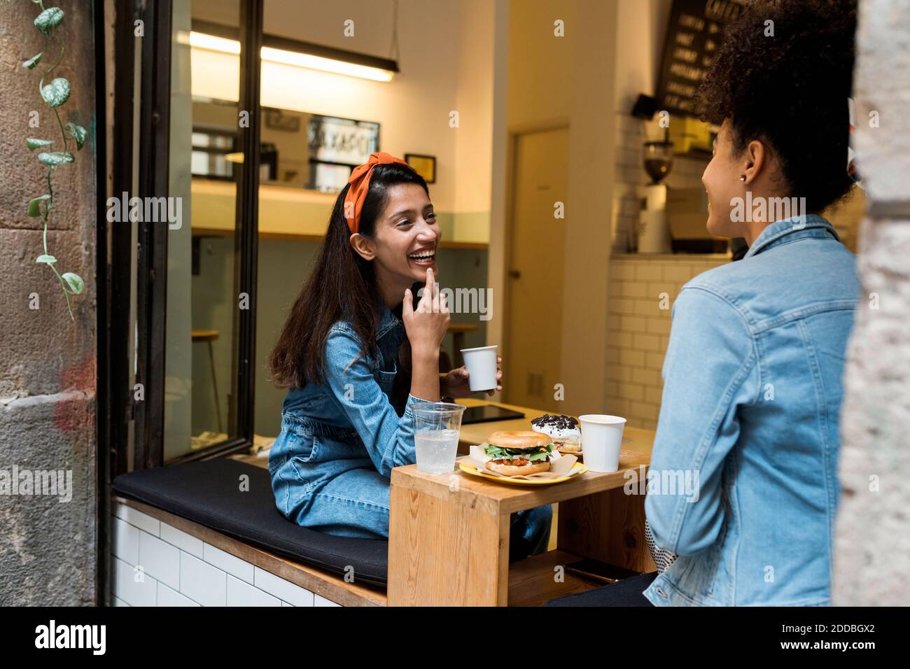 Two indian women talking hi-res stock photography and images - Alamy