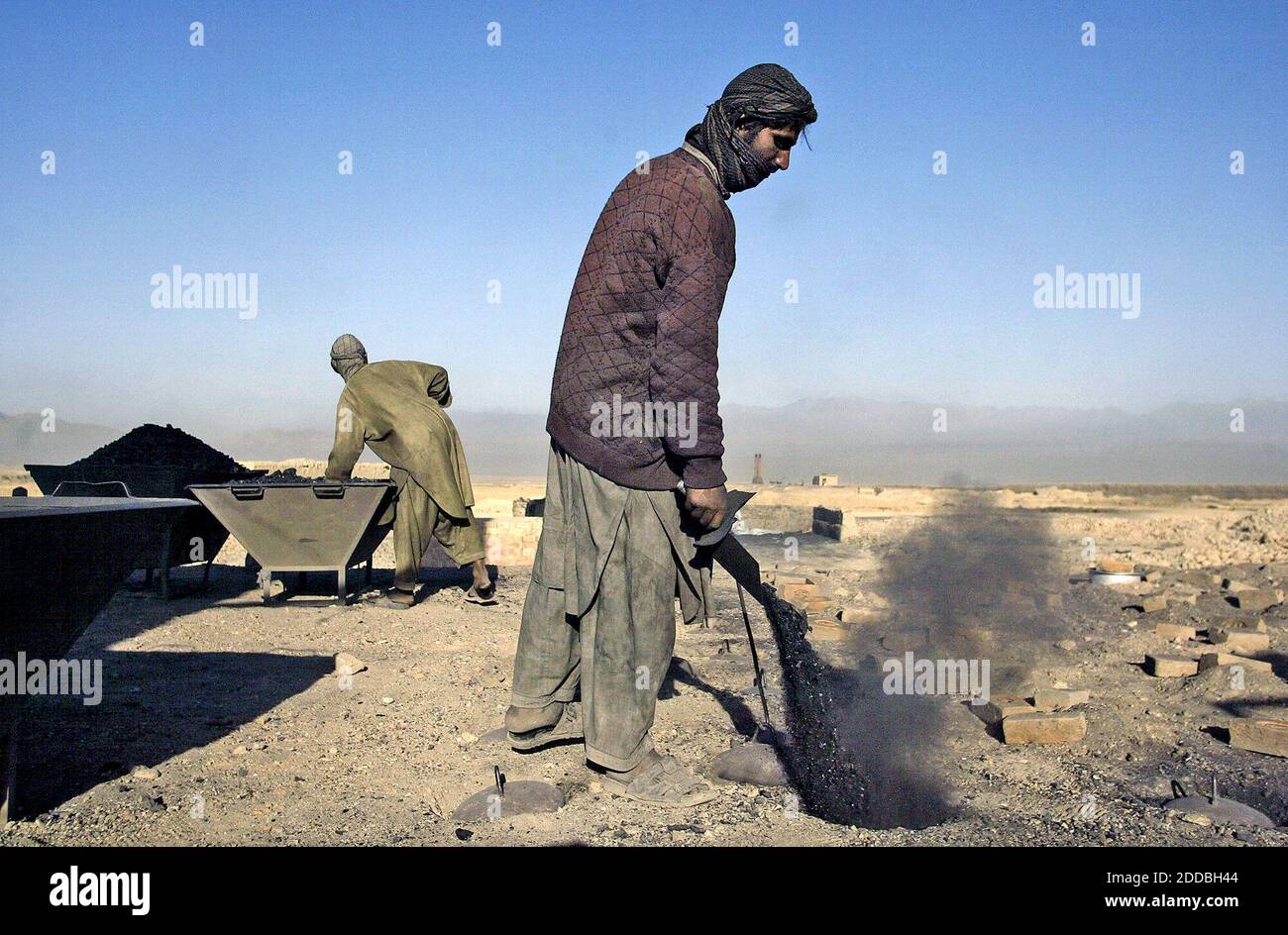 NO FILM, NO VIDEO, NO TV, NO DOCUMENTARY - Mohammod Ibrahim pours a ...