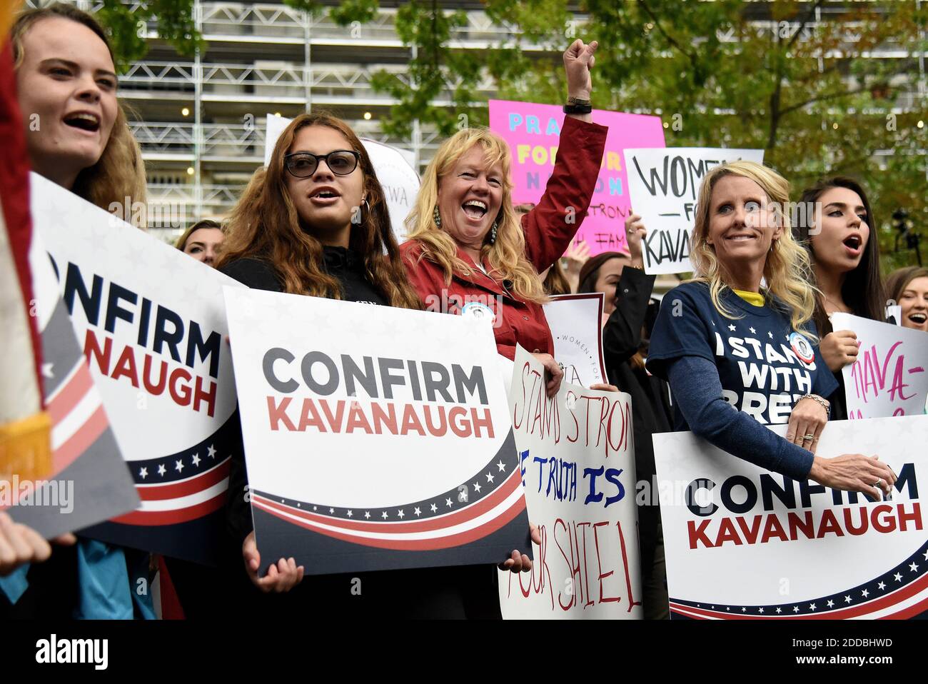 Demonstrators supporting he Supreme Court nominee Brett Kavanaugh holds ...