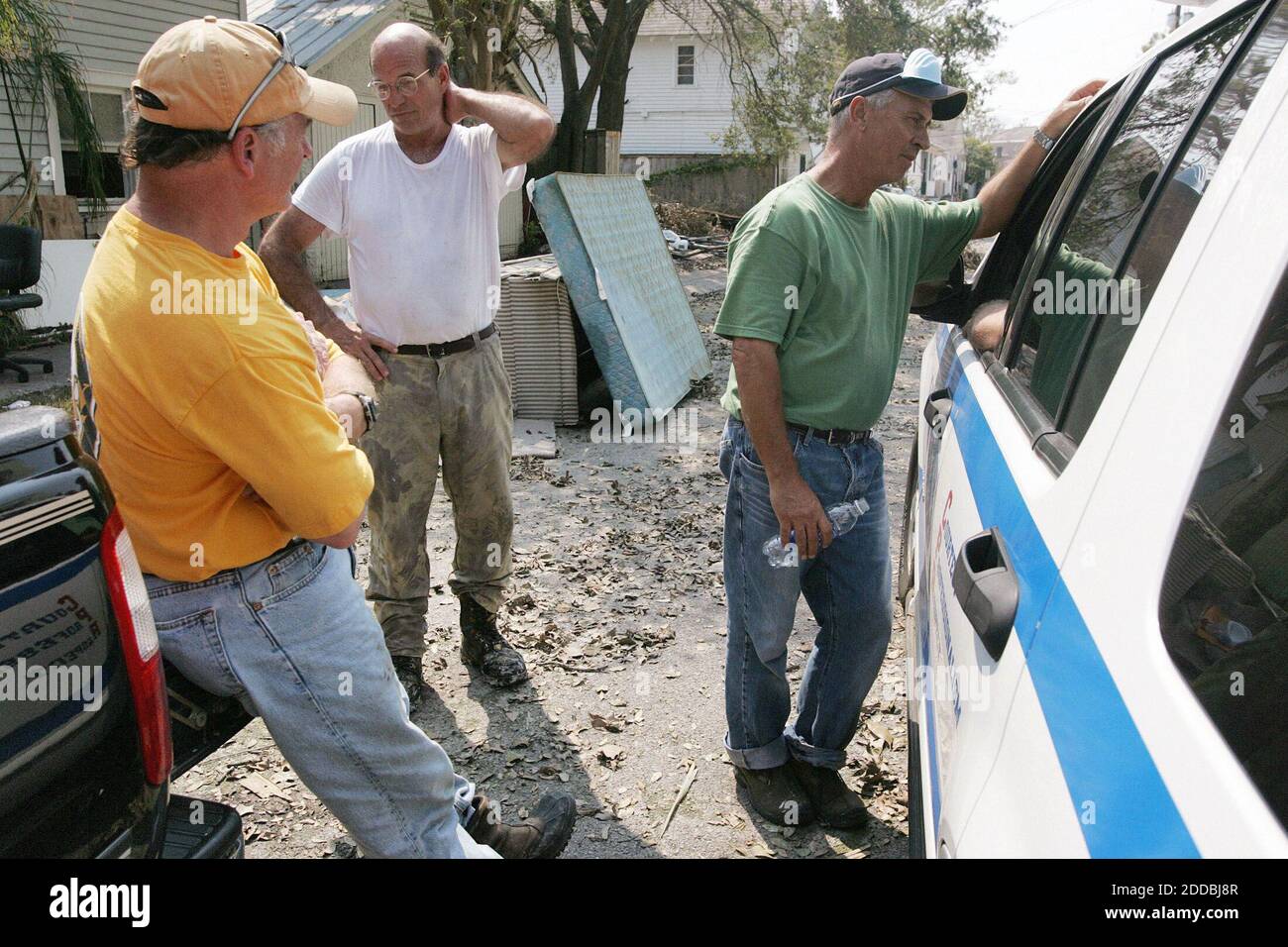 NO FILM, NO VIDEO, NO TV, NO DOCUMENTARY - NYPD police officers check ...