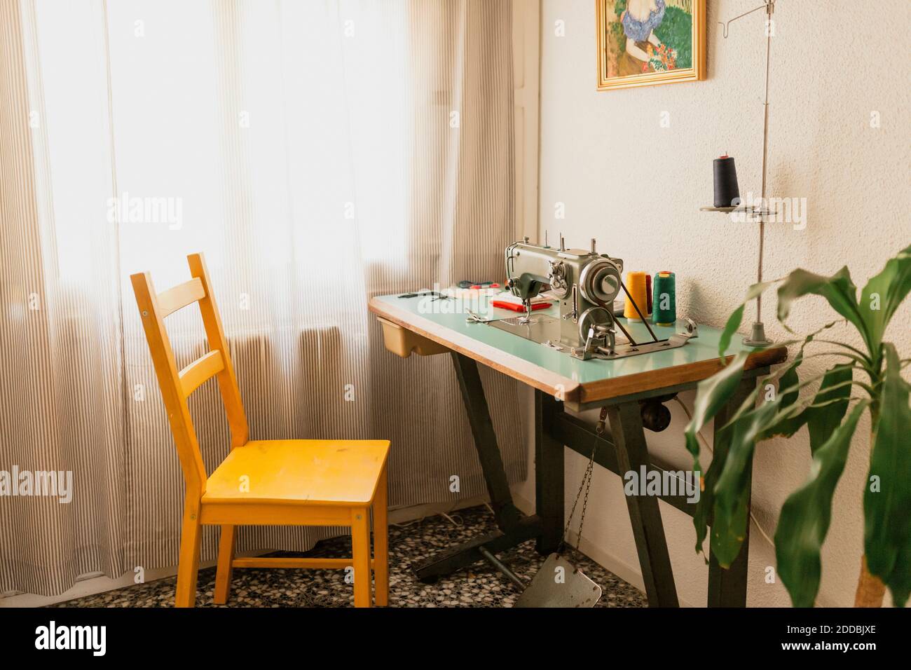 Interior of house with sewing machine Stock Photo - Alamy