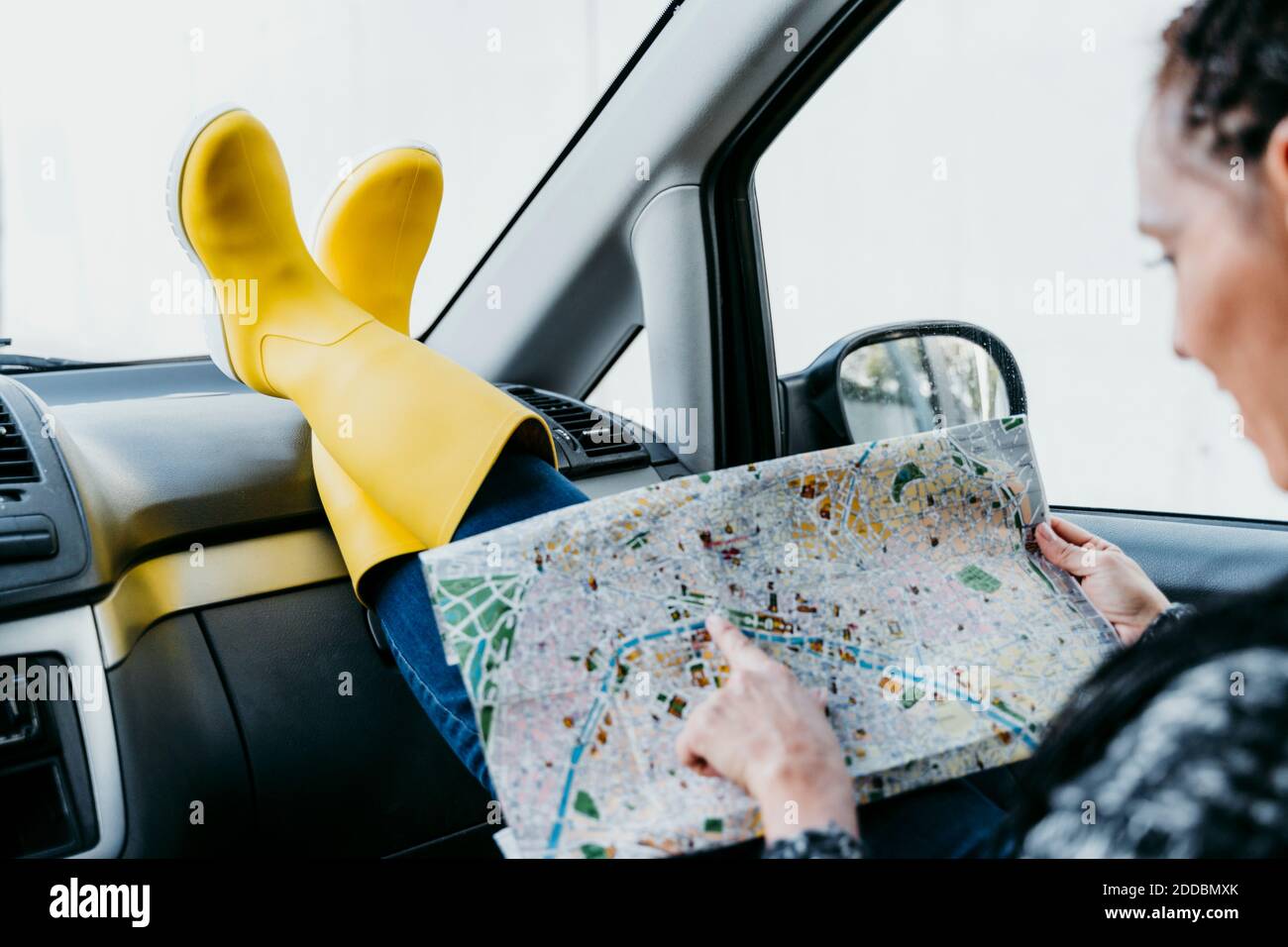 Woman wearing wellington boots hi-res stock photography and images - Alamy