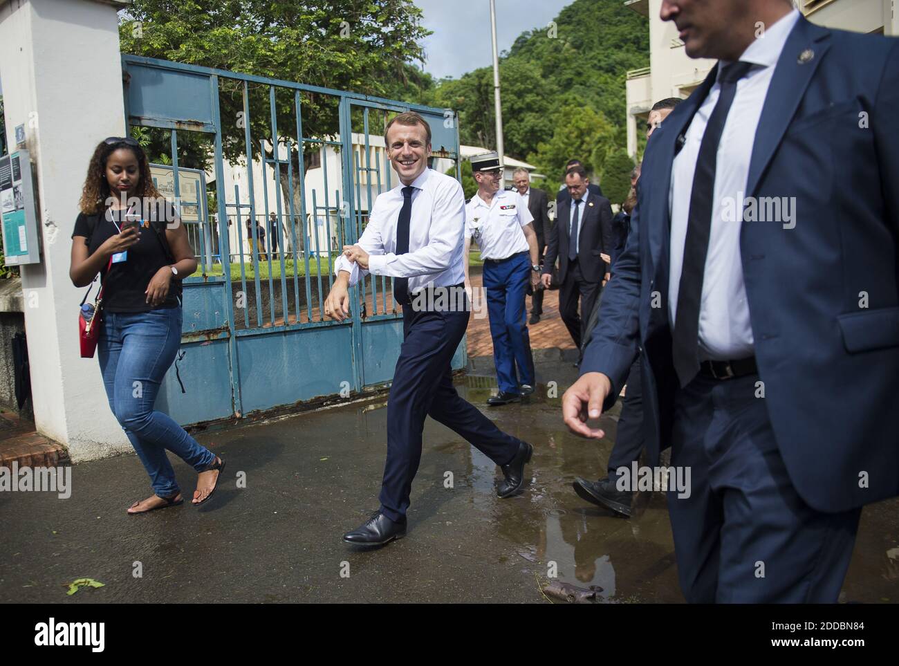 French President Emmanuel Macron leaves the Hotel de Ville (city hall ...