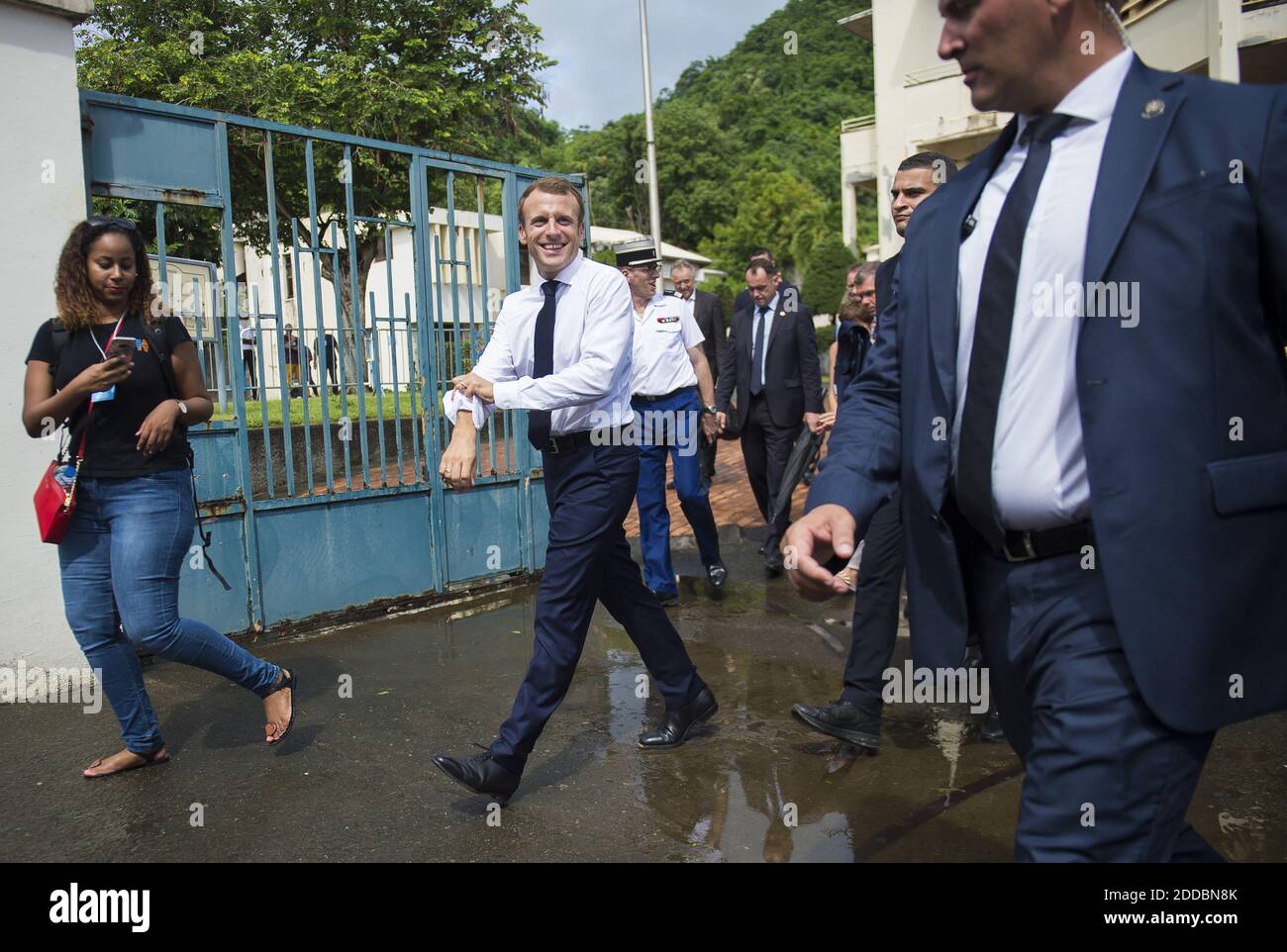 French President Emmanuel Macron leaves the Hotel de Ville (city hall ...