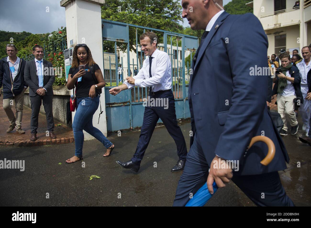 French President Emmanuel Macron leaves the Hotel de Ville (city hall ...