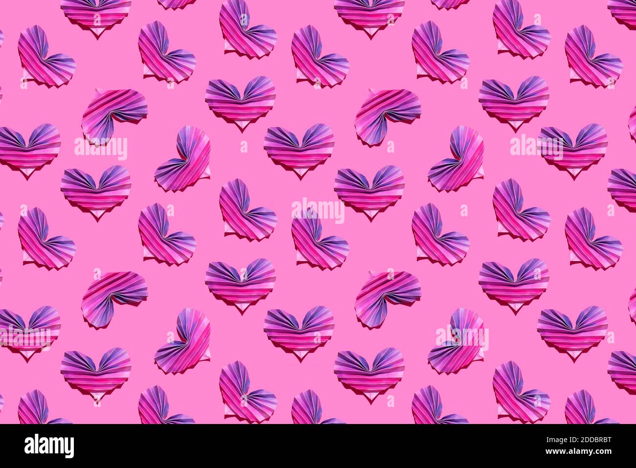Pattern of pink and purple origami hearts Stock Photo - Alamy