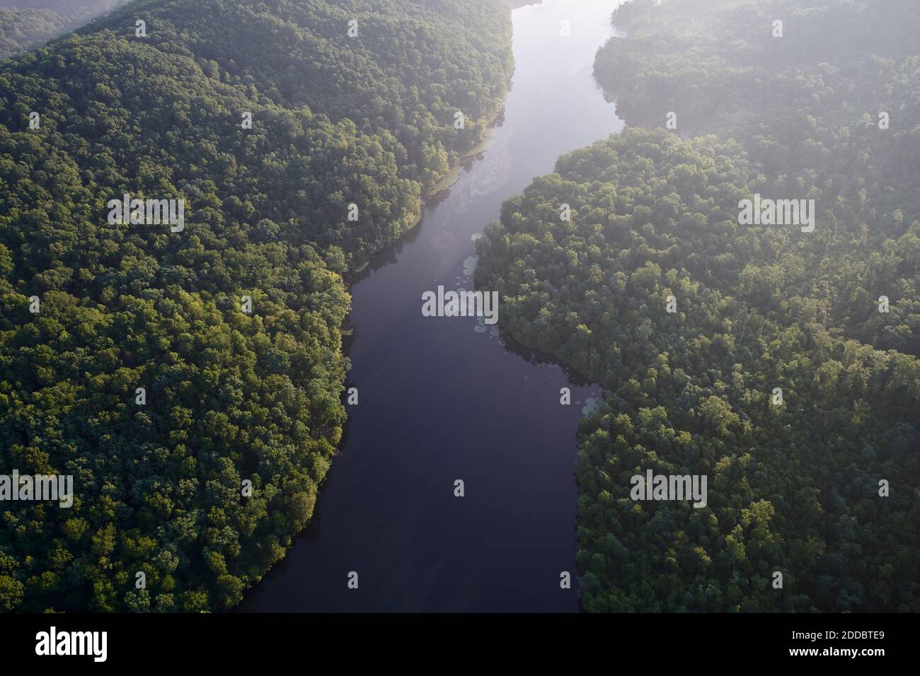 Aerial view of river flowing through Appalachian forest at dawn Stock ...